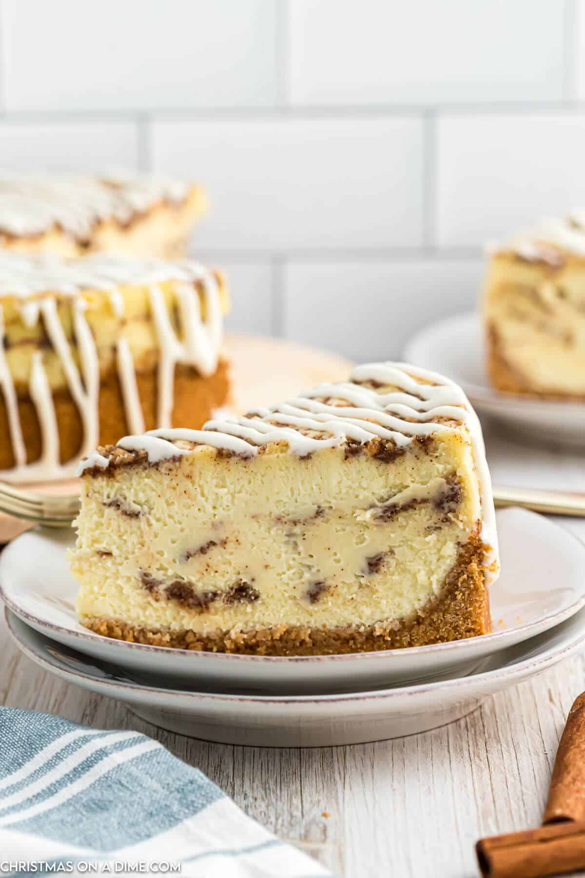 Cinnamon Roll Cheesecake - christmasonadime.com